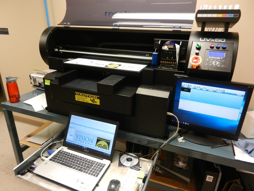 New printer amps up UV flatbed color printing | Pella Engraving & Sign ...